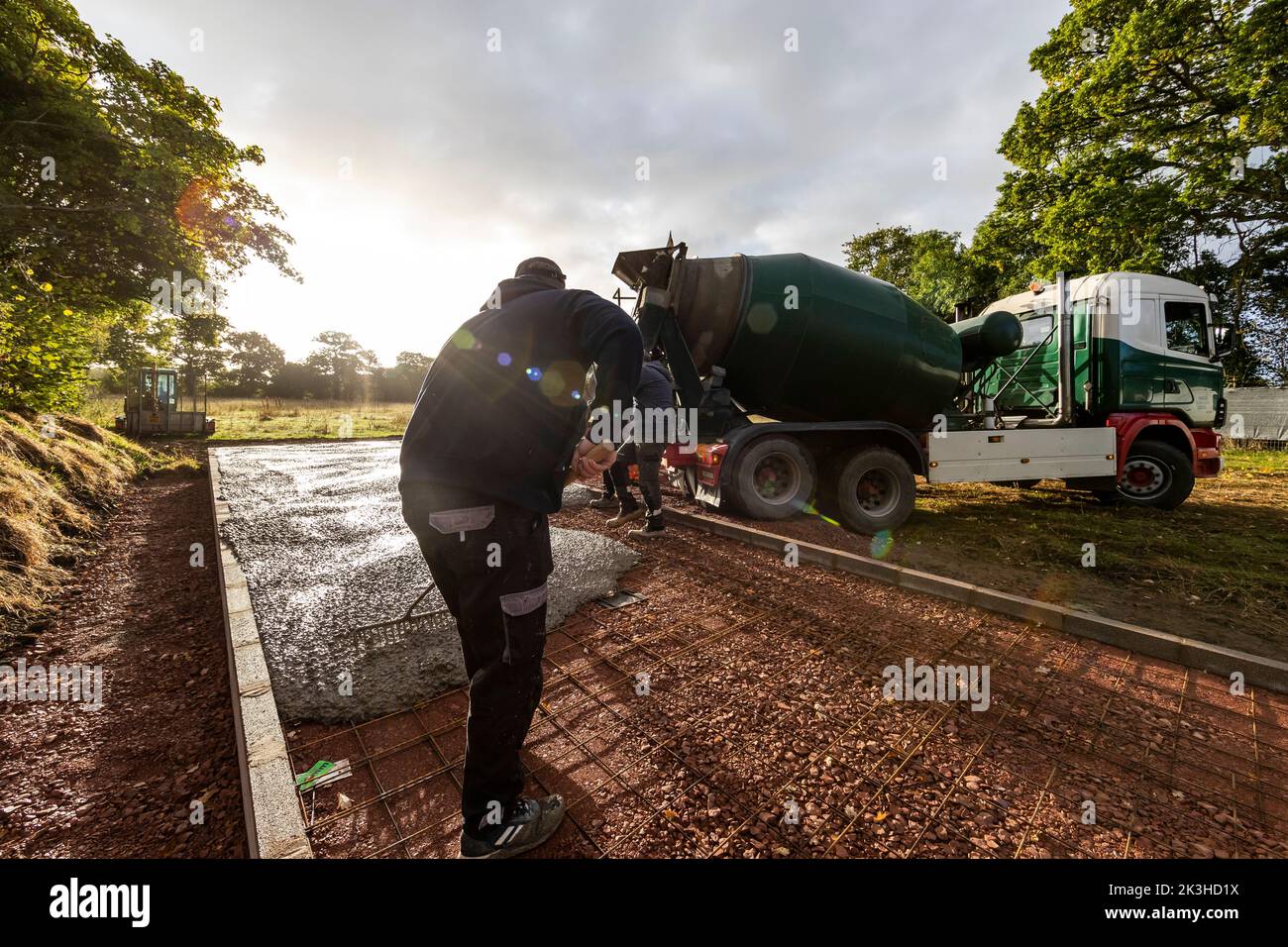 Early morning concrete pouring of a stable block slab. Seen as lacking ...
