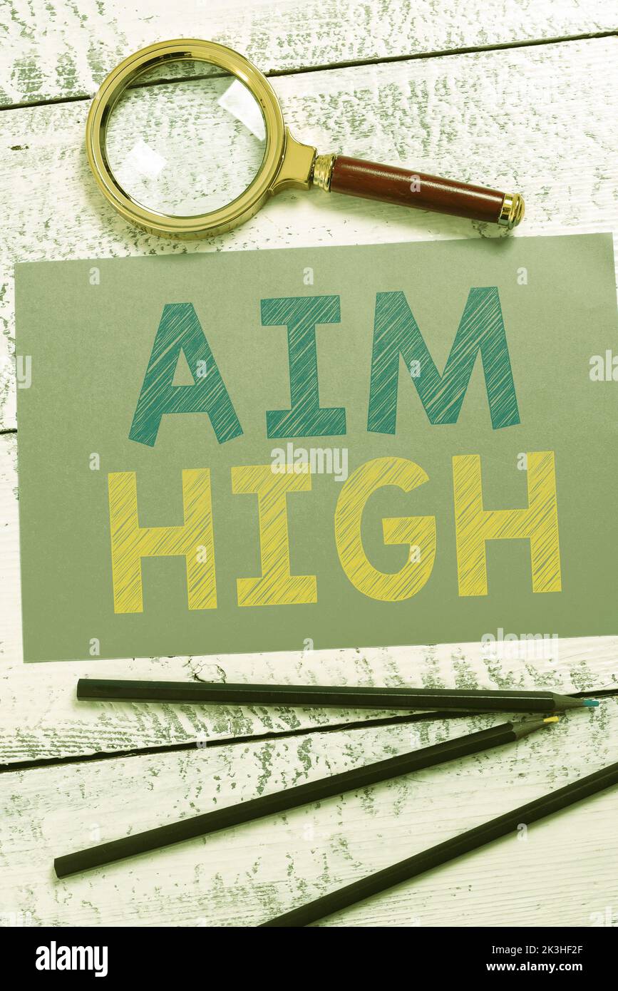 Writing displaying text Aim High, Business overview go for best job ...