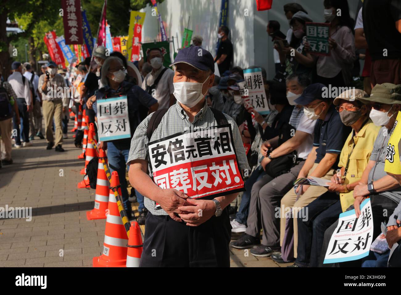 Tokyo, Japan. 27th Sep, 2022. A protester holds a placard expressing ...