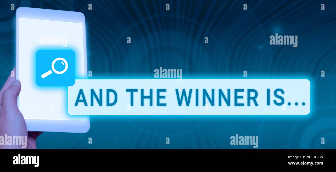 Text sign showing And The Winner Is.... Business concept Announcing who ...