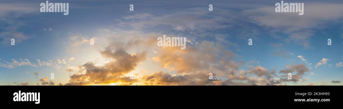 Dark blue sunset sky panorama with golden Cumulus clouds. Seamless hdr ...