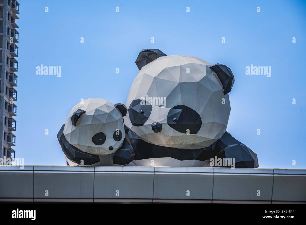 Photo shows the giant panda statue on the top of a building in Nanning ...