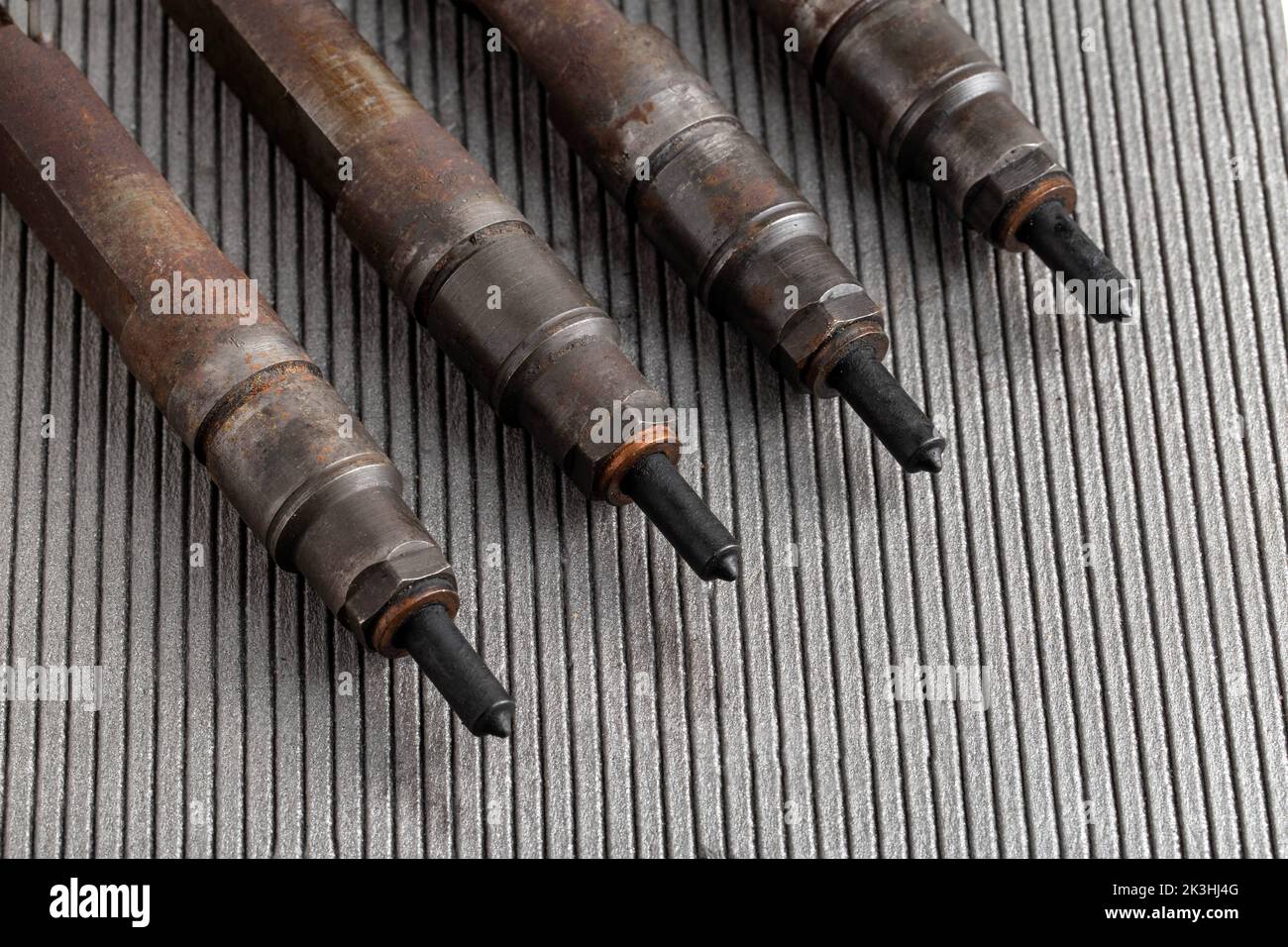Mechanical injectors from a diesel engine, close-up. Fuel atomization ...