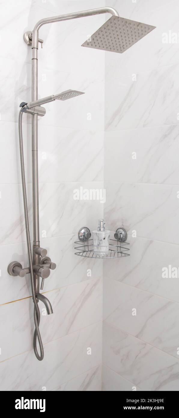Modern square shower head with large and small head Stock Photo - Alamy