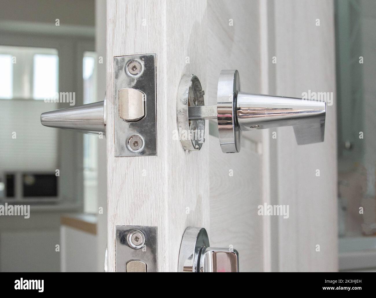 Damaged interior door handle. Poor quality door hardware. Breaking the ...