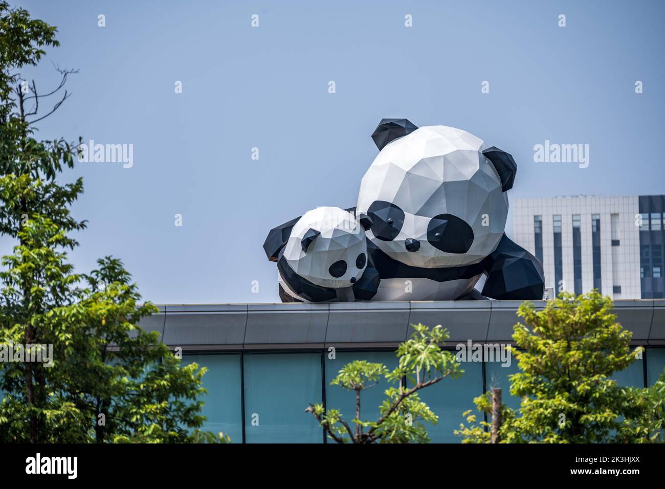Photo shows the giant panda statue on the top of a building in Nanning ...