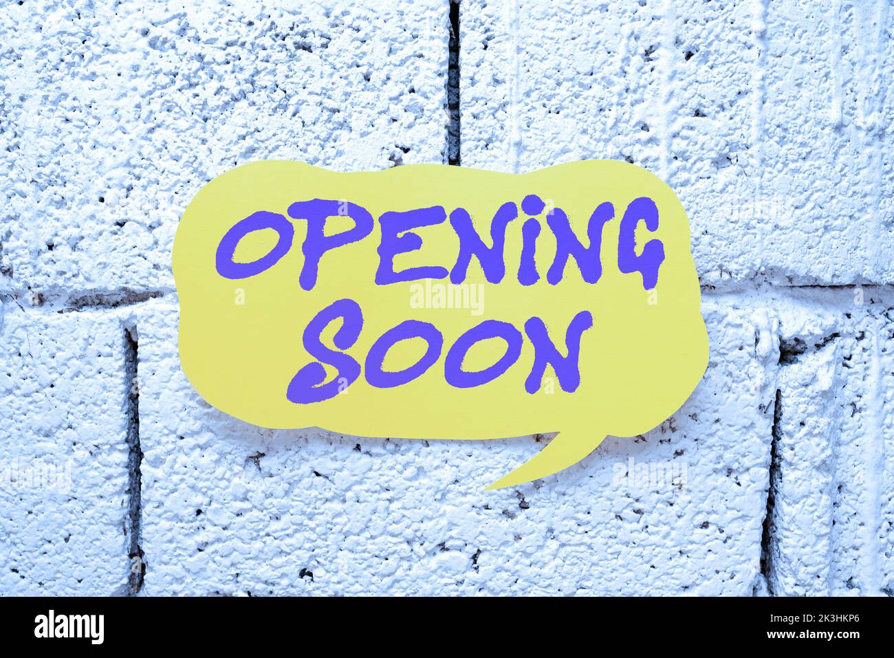 Hand writing sign Opening Soon. Word for Going to be available or ...