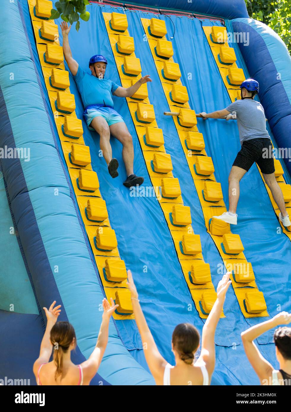 Adult man sliding down slide hi-res stock photography and images - Alamy