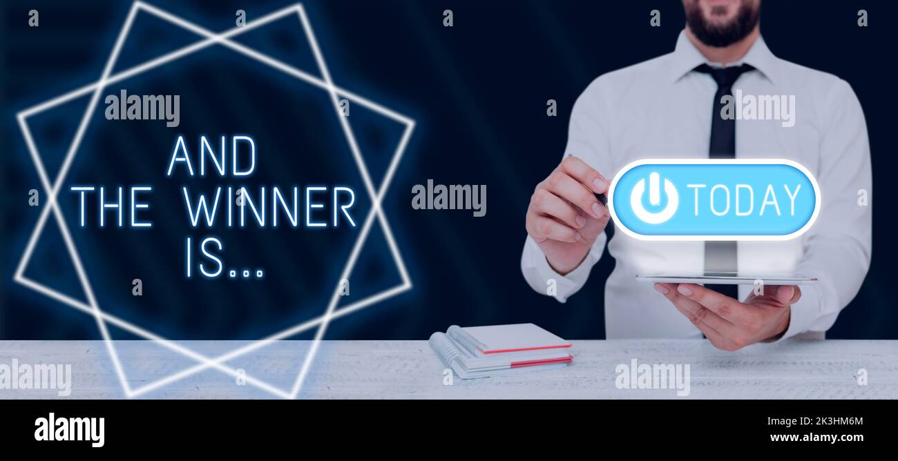 Sign displaying And The Winner Is.... Business overview Announcing who ...