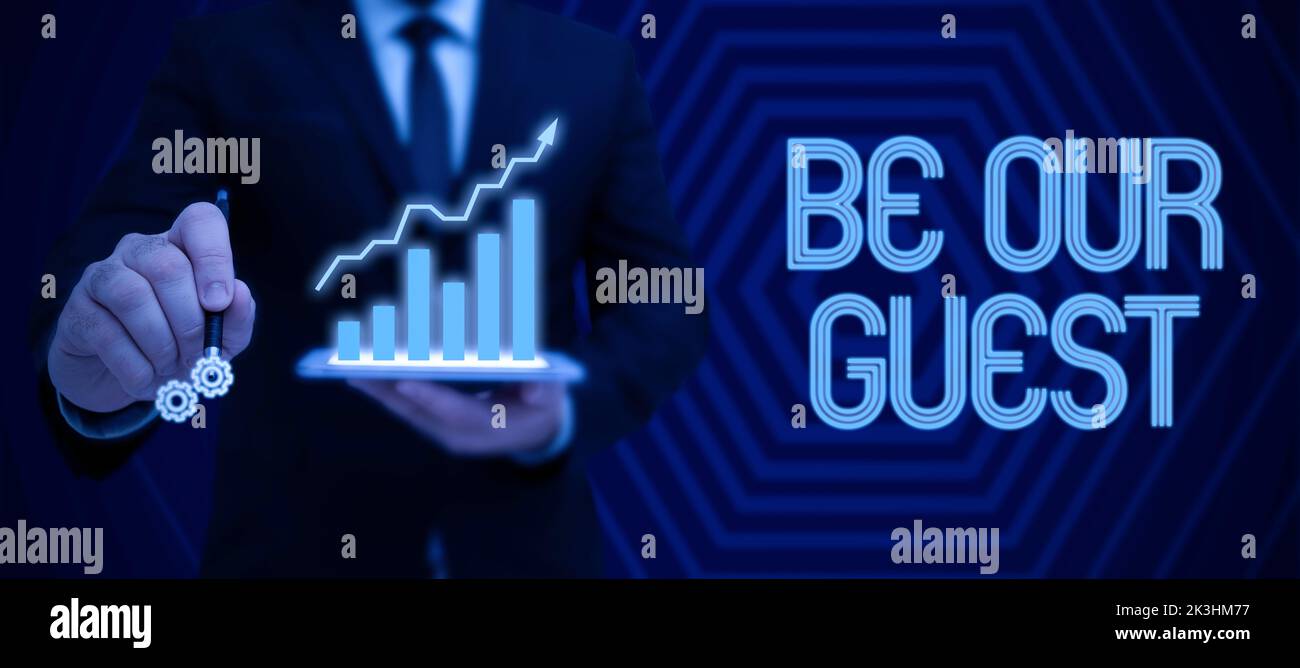 Hand writing sign Be Our Guest. Word Written on You are welcome to stay ...