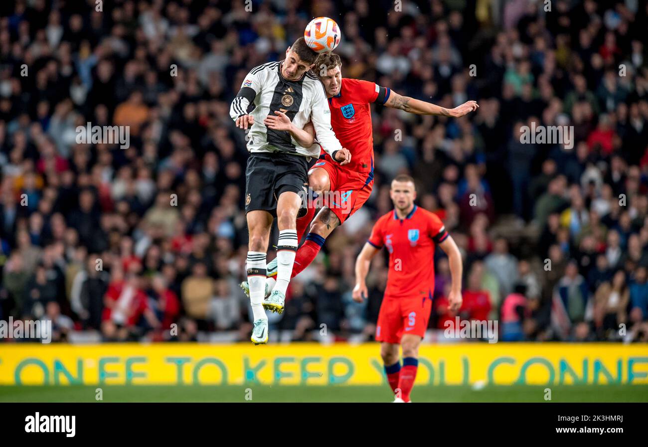 London, UK. 27th Sep, 2022. David Raum of Germany and John Stones of ...
