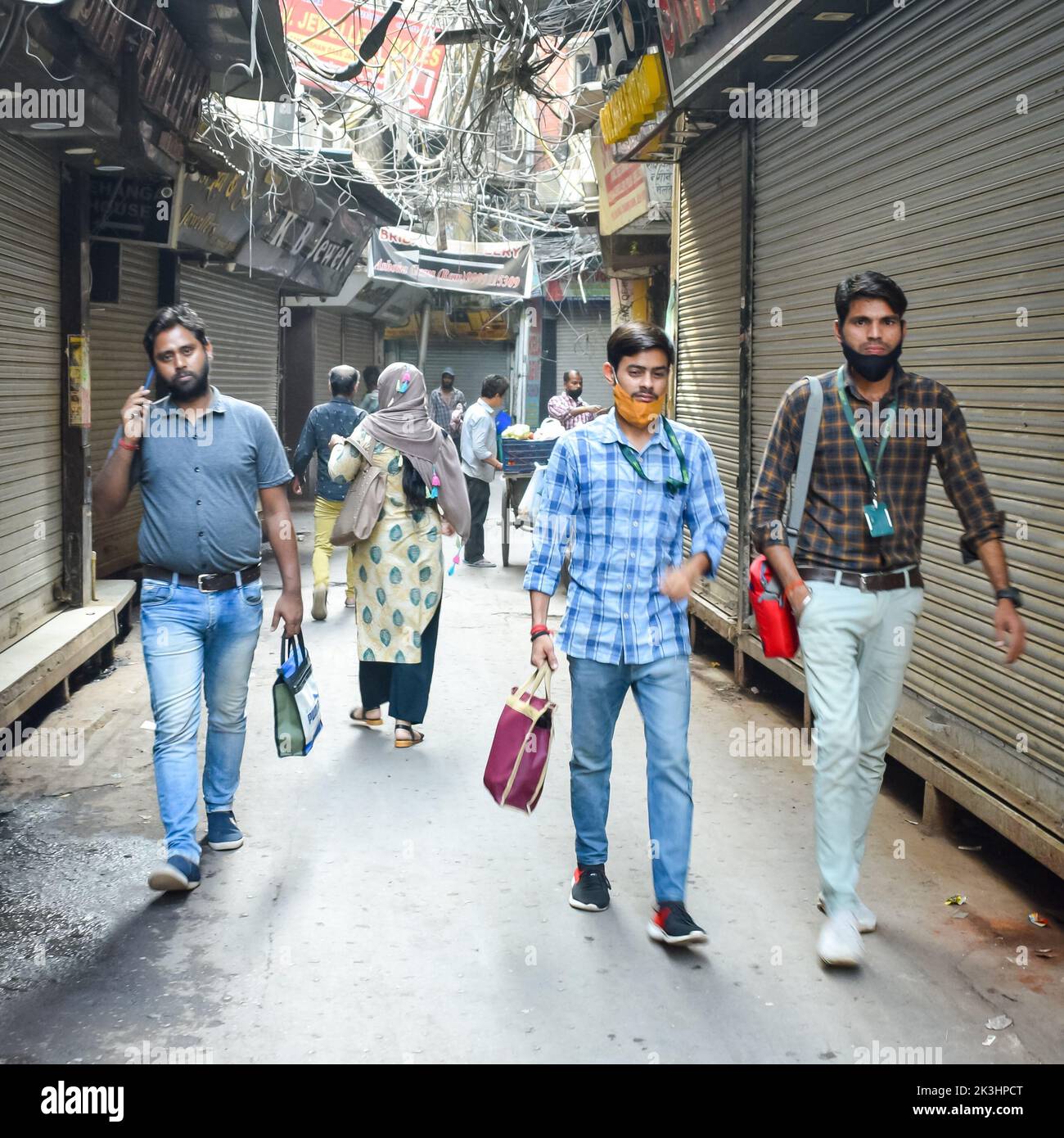 Old Delhi, India, April 15, 2022 - Unidentified group of men walking ...