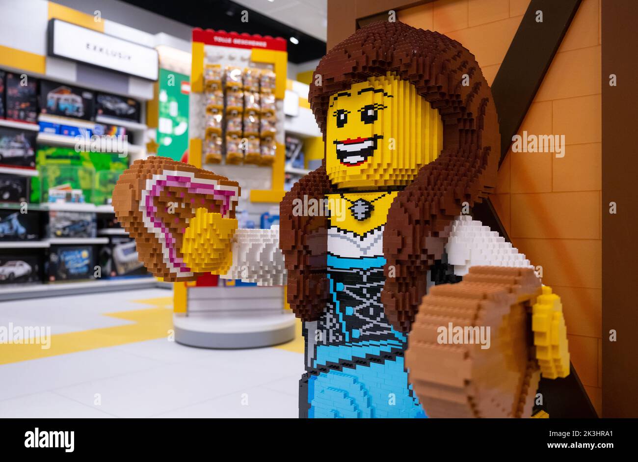 Munich, Germany. 27th Sep, 2022. A Lego figure wearing a dirndl is seen ...