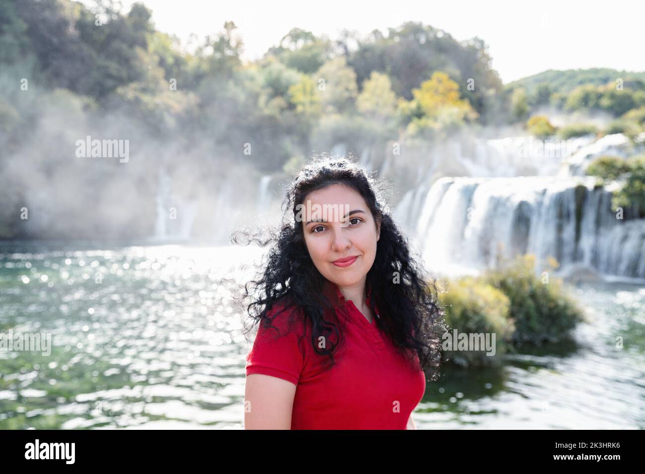 The beautiful woman with long curly hair opposite the Skradinski Buk ...