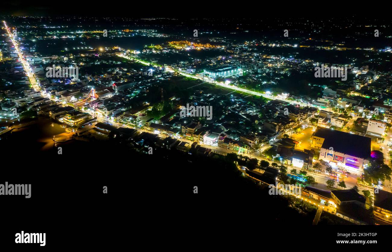 Chau Doc city, An Giang, Vietnam at night, aerial view. This is a large ...