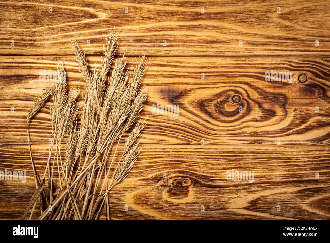 Wheat Ears on the Wooden Table. Sheaf of Wheat over Wood Background ...