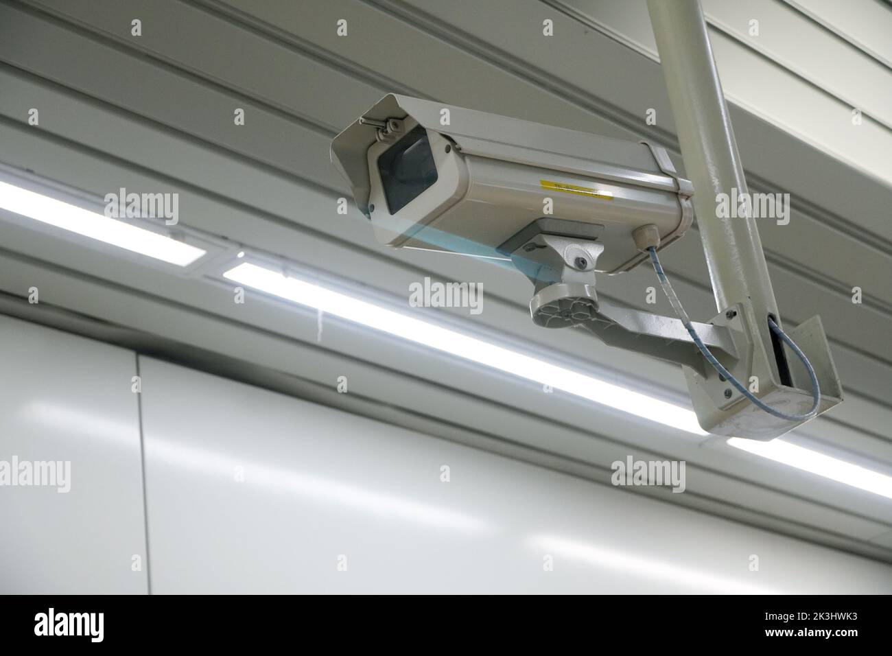CCTV, security camera on a wall Stock Photo - Alamy