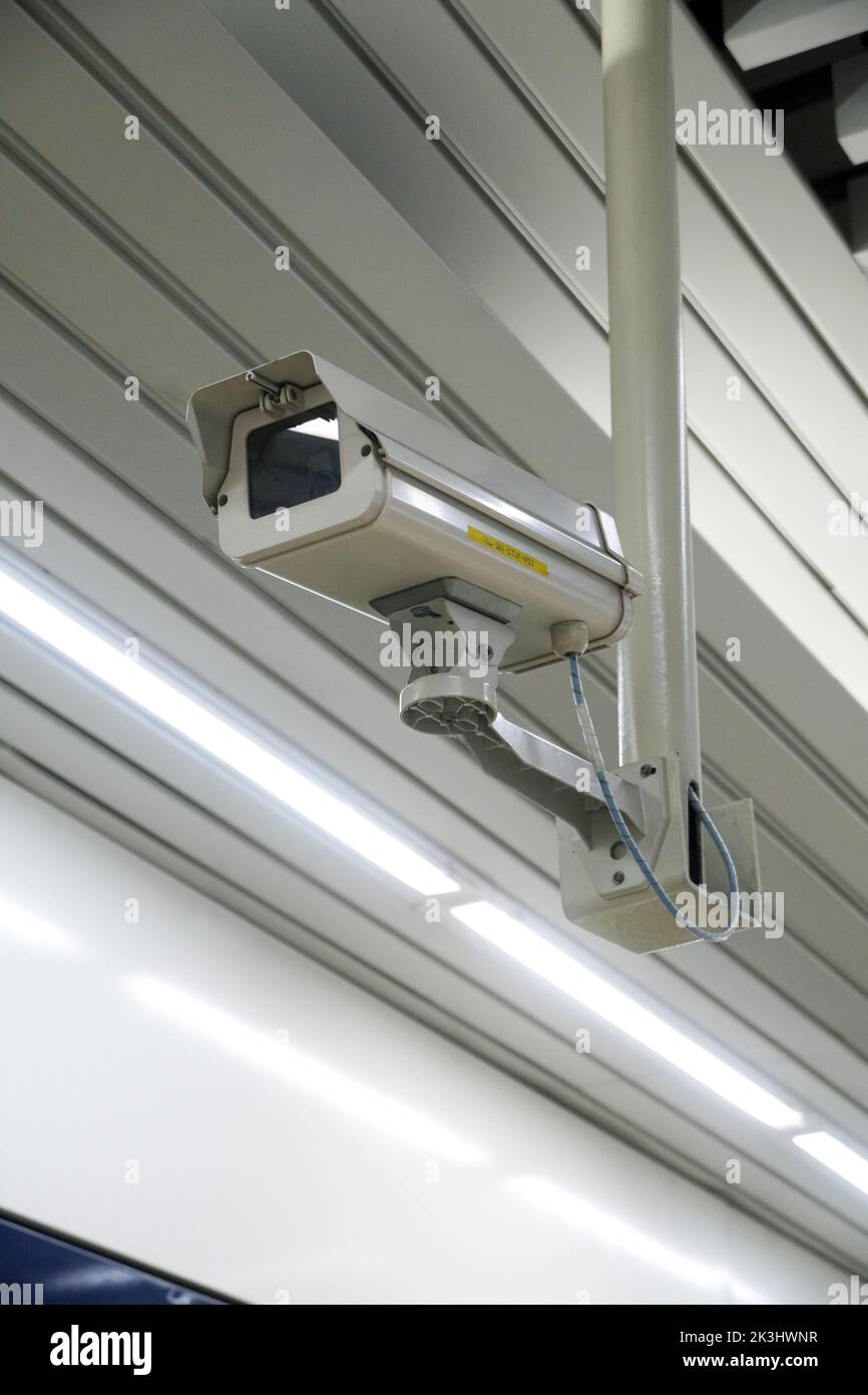 CCTV, security camera on a wall Stock Photo - Alamy