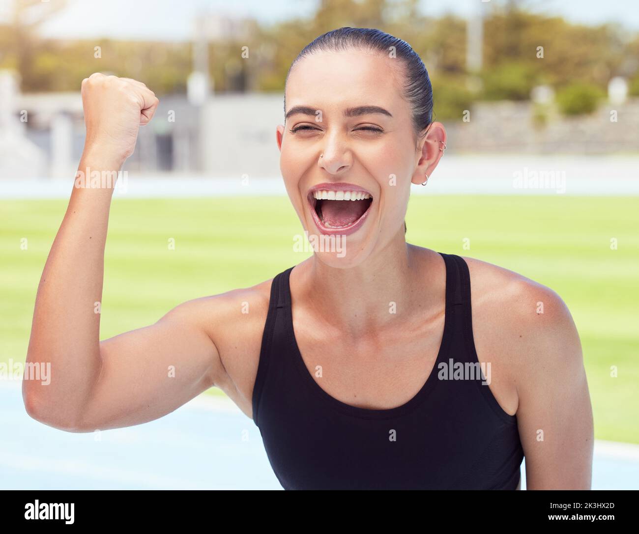 Woman running cheering hi-res stock photography and images - Alamy