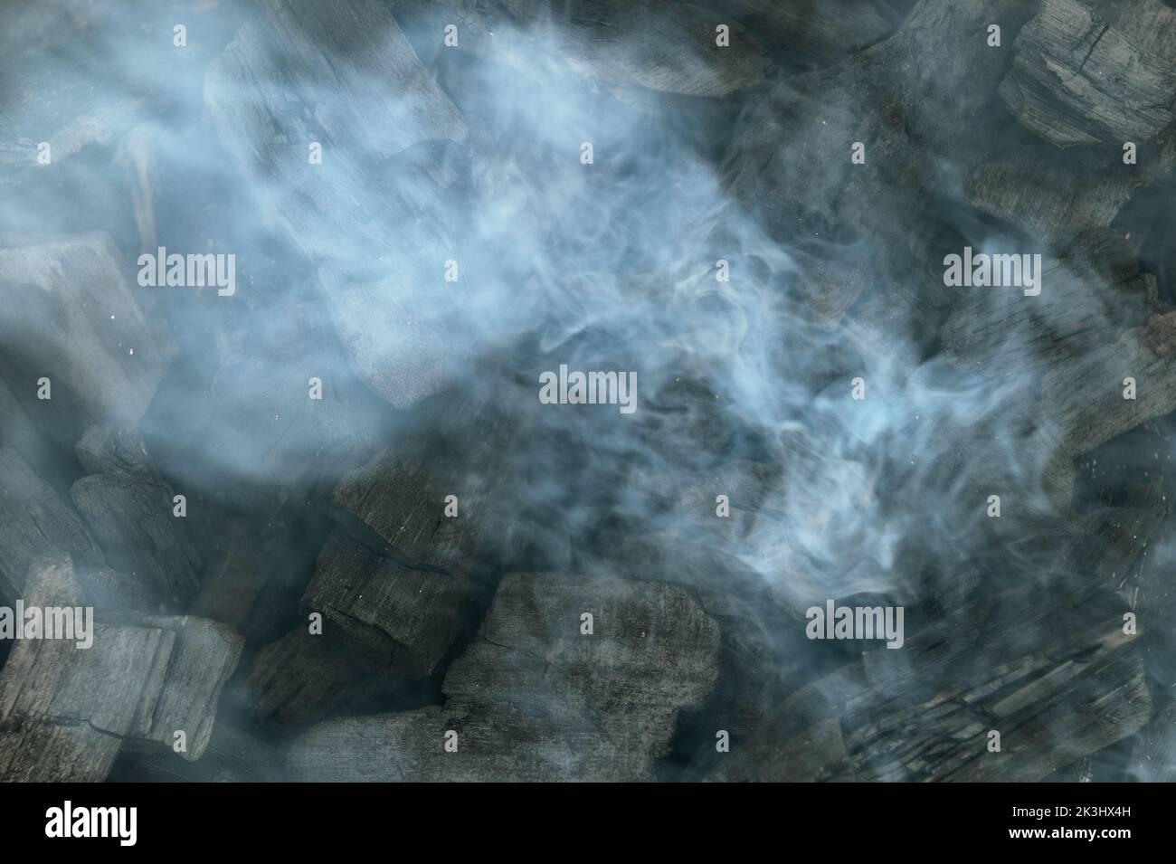 Smoking coals close up. Close up of burning coals Stock Photo - Alamy