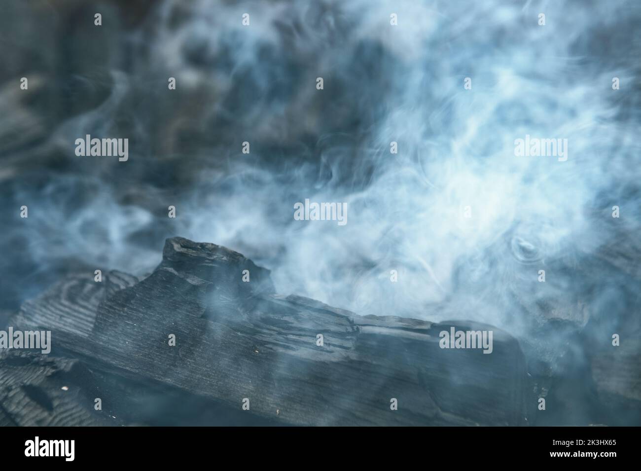 Smoking coals close up. Close up of burning coals Stock Photo - Alamy