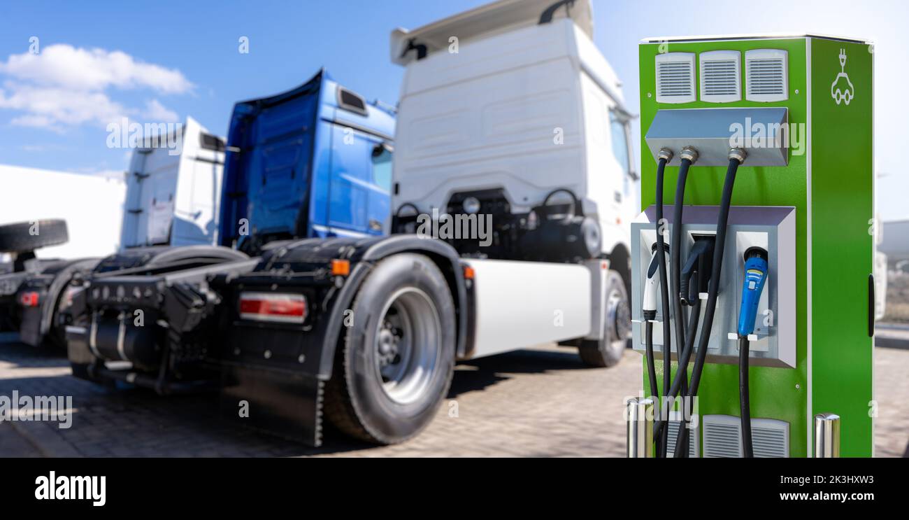 Electric truck with charging station. Concept Stock Photo - Alamy