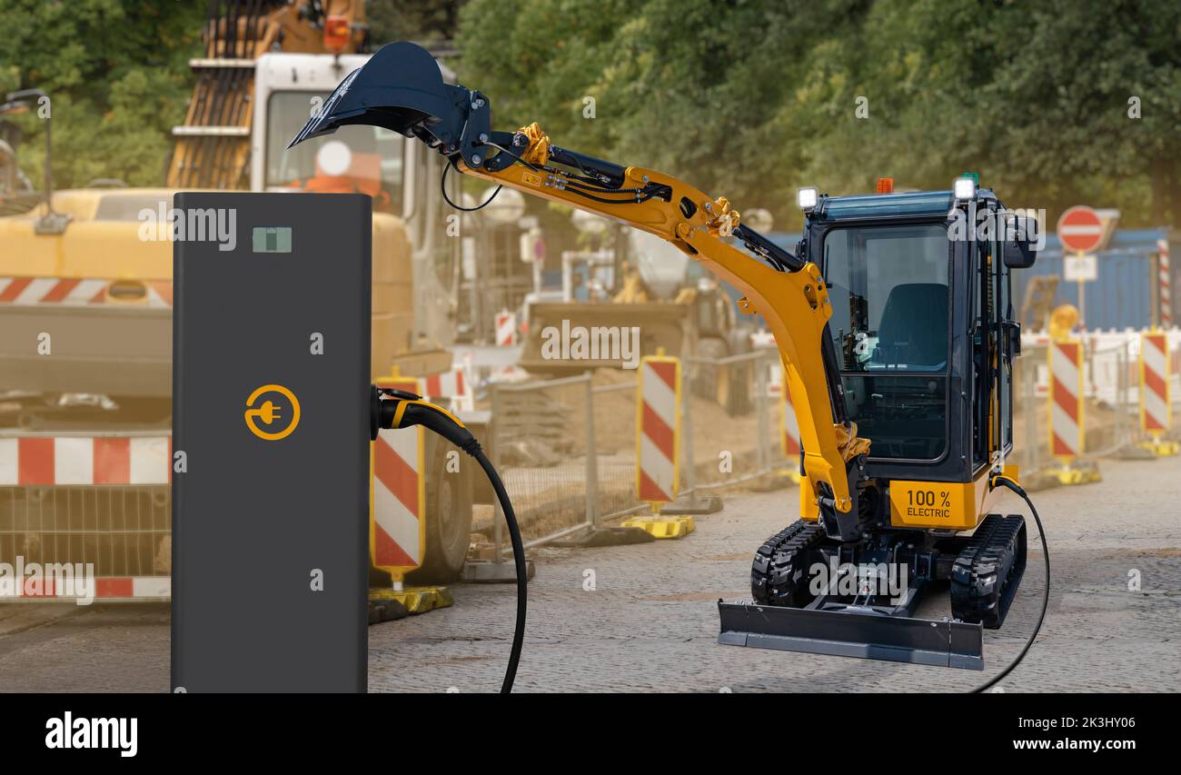 Concept of electric city excavator with charging station Stock Photo ...