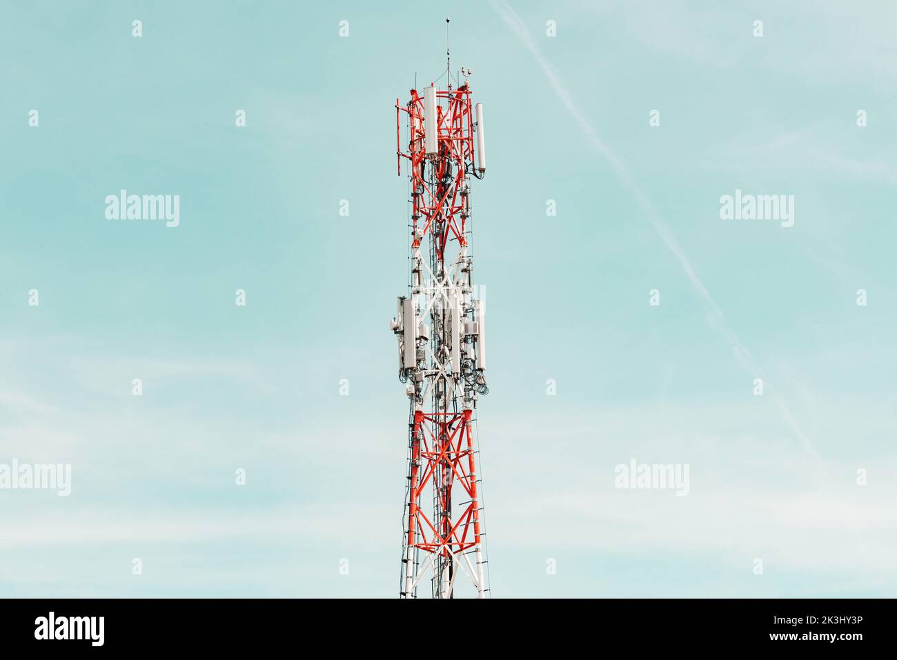 Telecommunication tower against the blue sky, communication technology ...