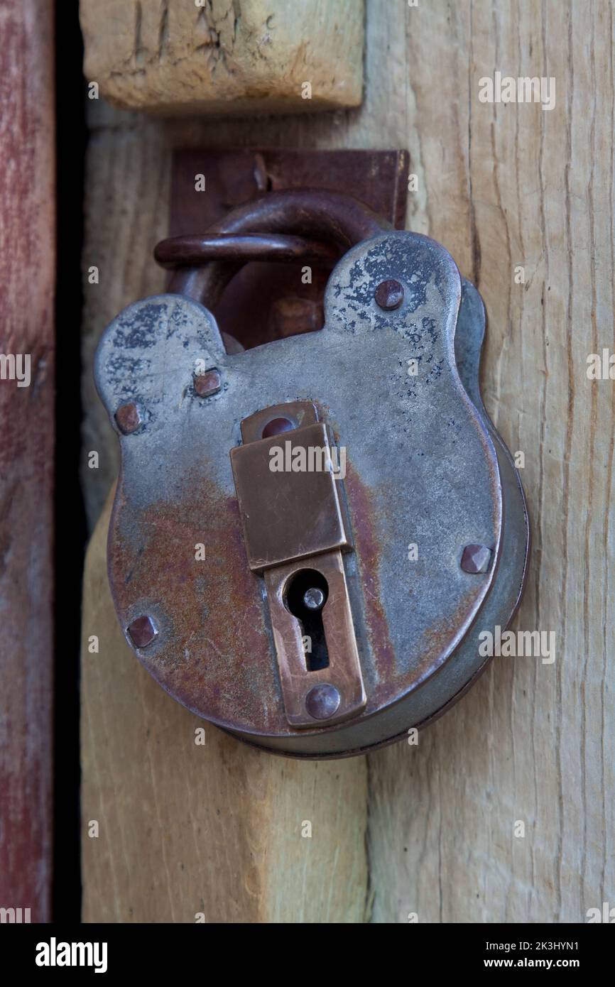 Antique Padlock On Wooden Door Stock Photo - Alamy