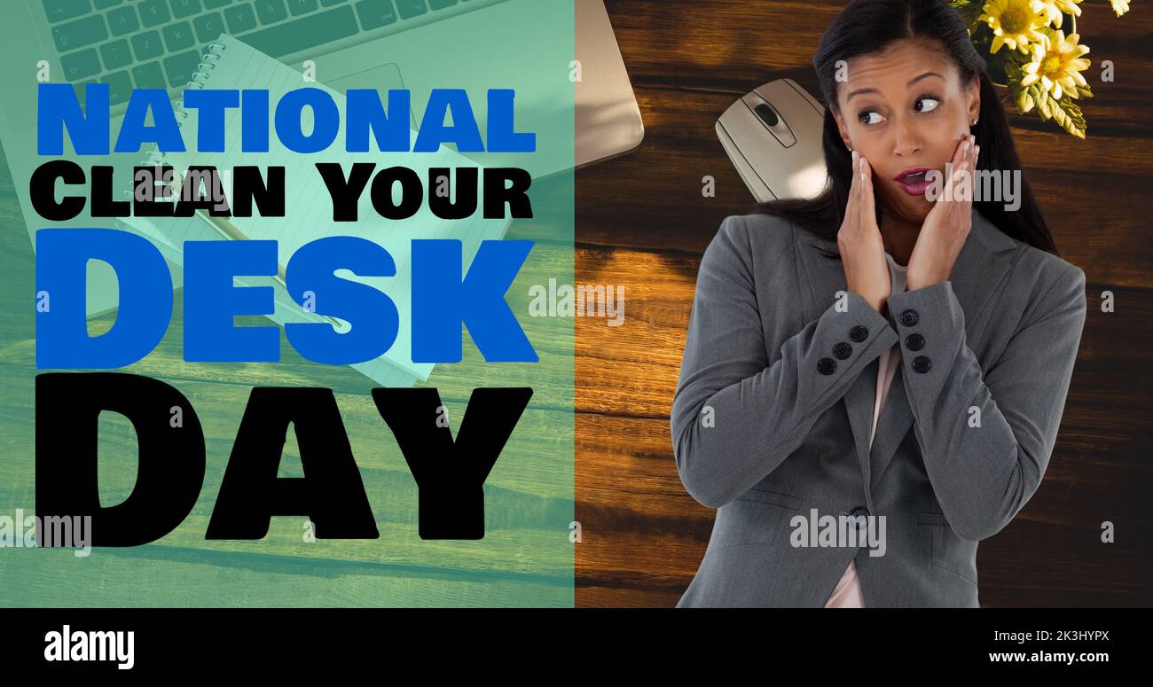 Composite of national clean your desk day text and amazed biracial ...