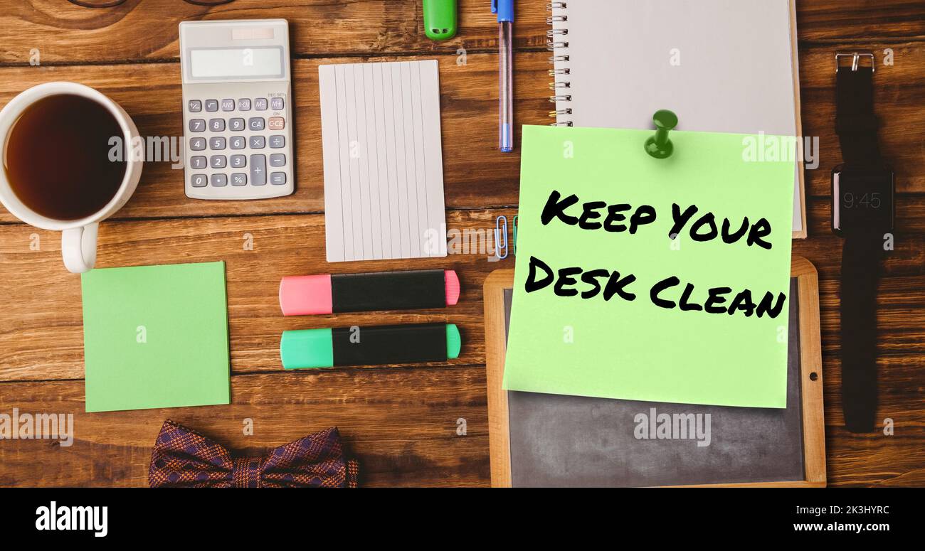 Keep your desk clean text on sticky note with various office supplies ...