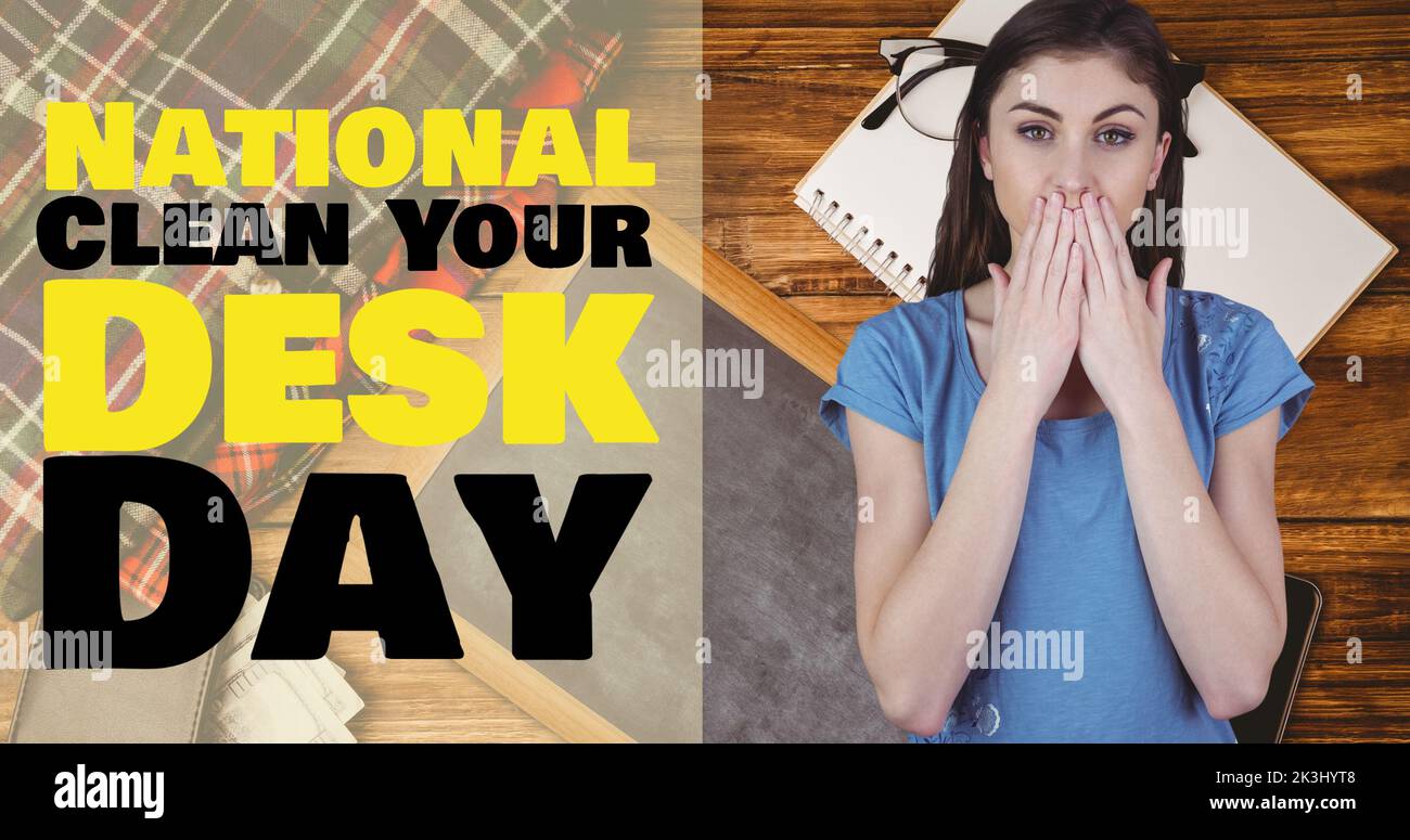 Composite of national clean your desk day text with amazed caucasian ...