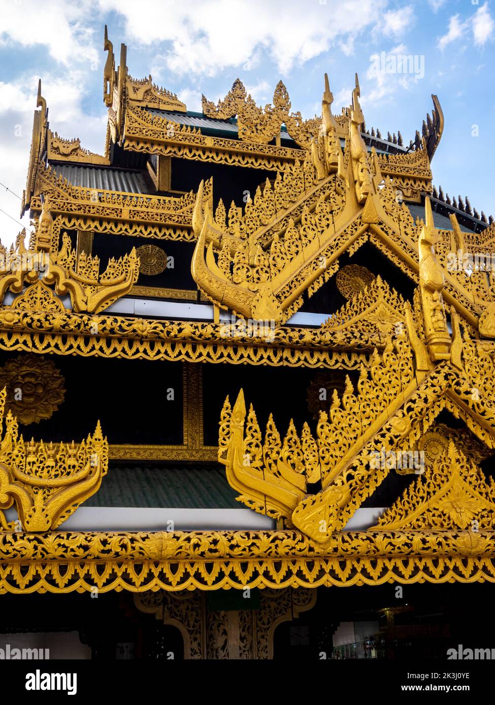 The golden square hall with a pyramidal roof castle mondop and golden ...