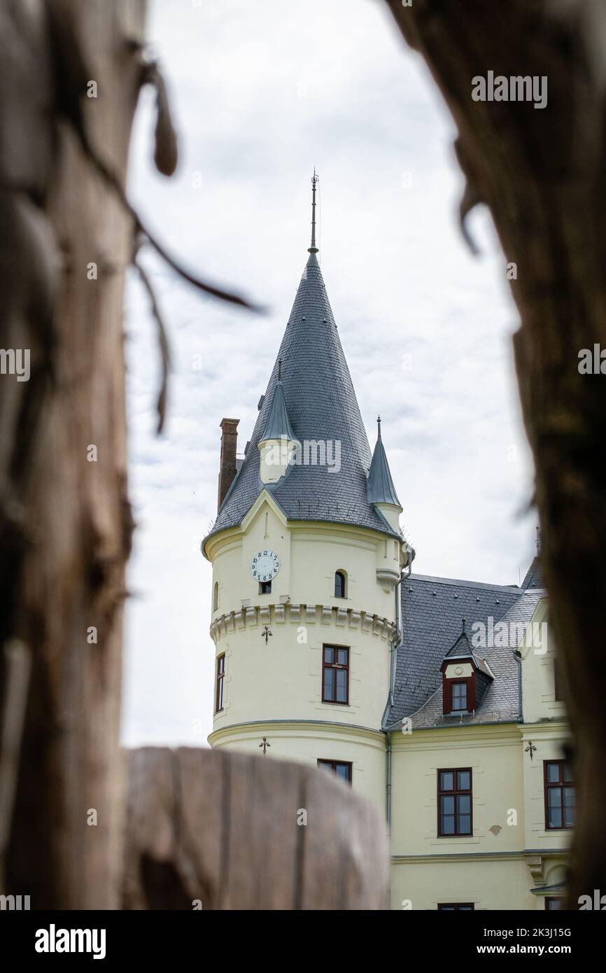 A vertical shot of the clocktower of Andrassy Castle in the north ...