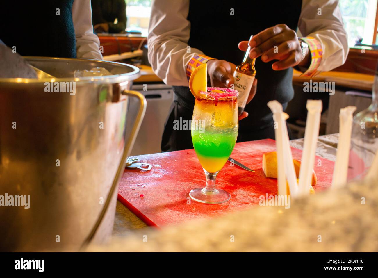 A Rainbow nuclear cocktail prepared in africa Stock Photo - Alamy