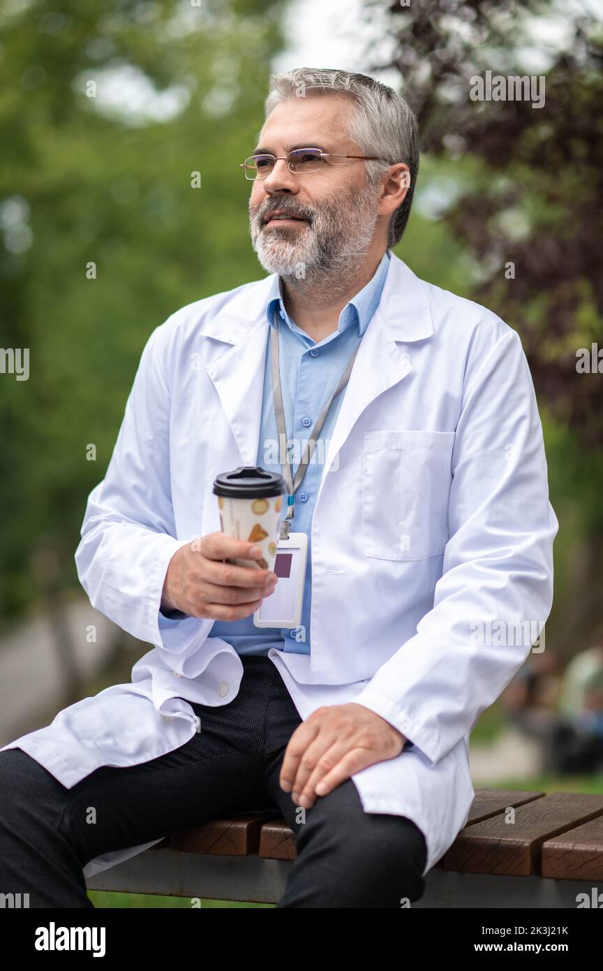 Bearded doctor in lab coat hi-res stock photography and images - Alamy