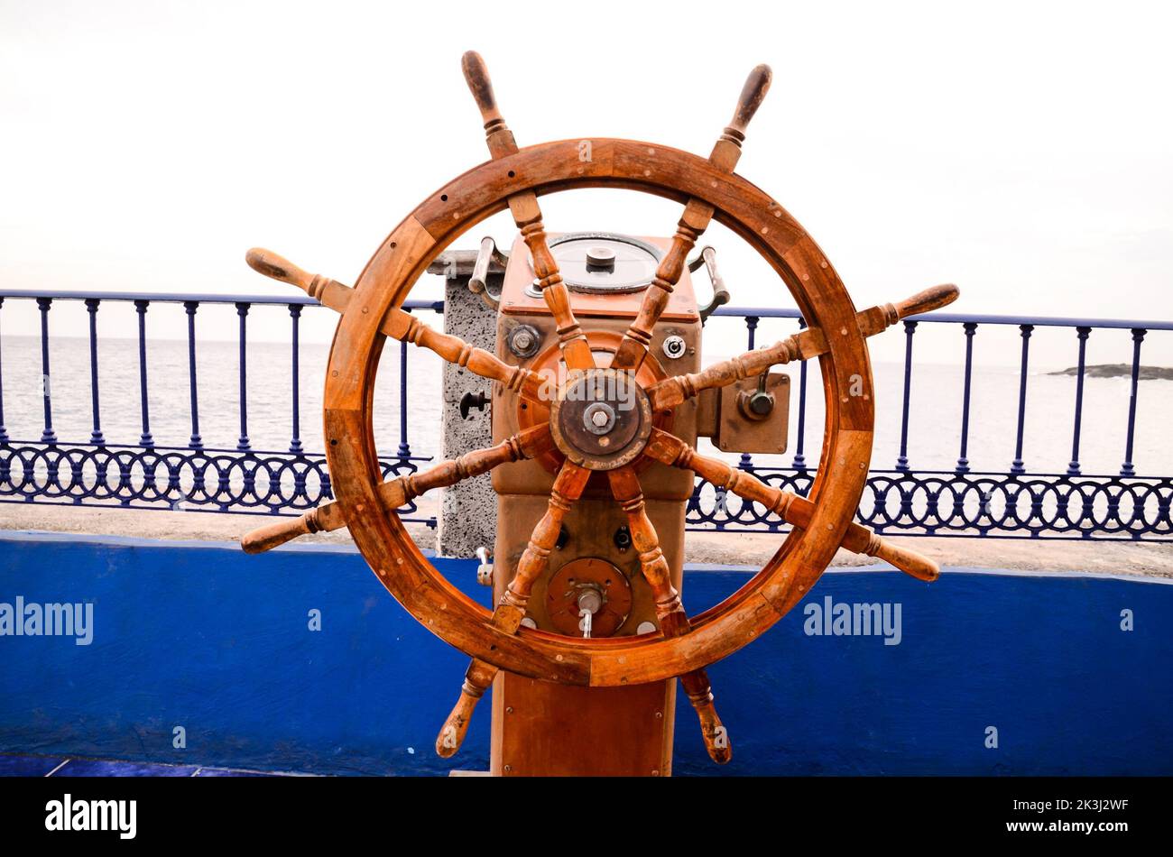 Old Vintage Wooden Helm Wheel near Blue Ovcean Stock Photo - Alamy