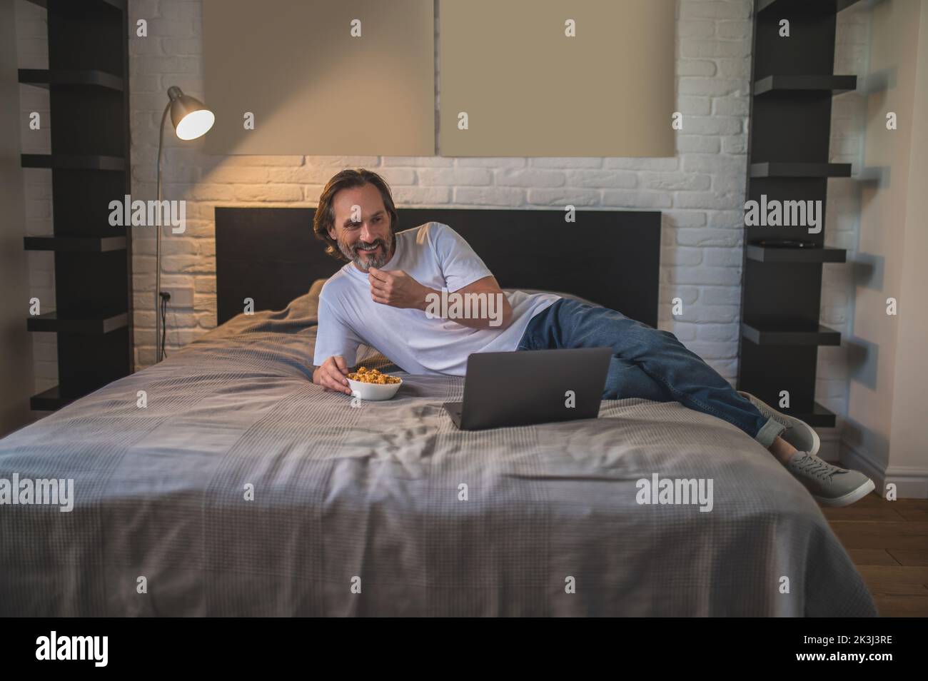 Bearded man watching something hi-res stock photography and images - Alamy