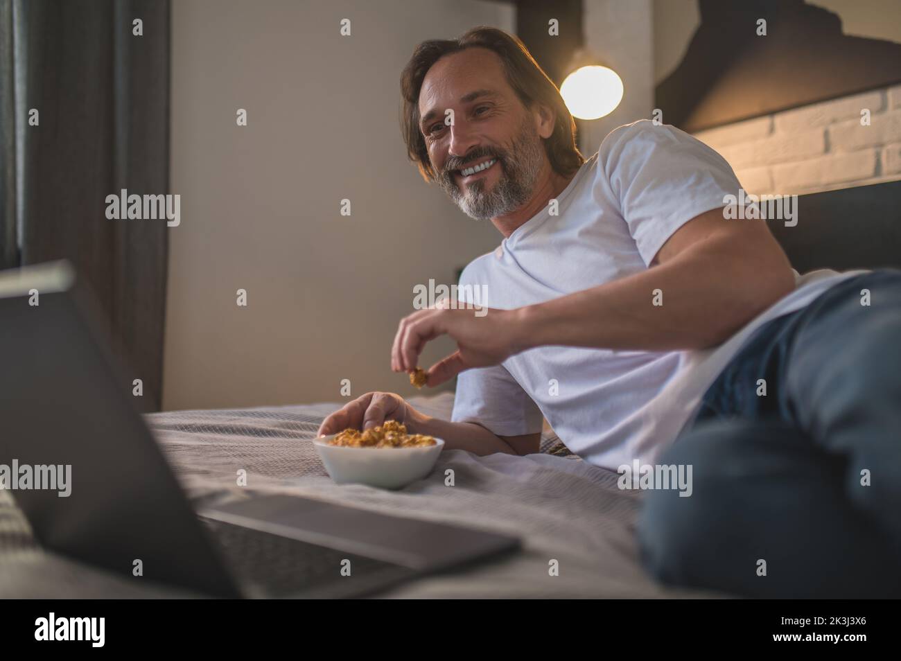 Bearded man watching something hi-res stock photography and images - Alamy