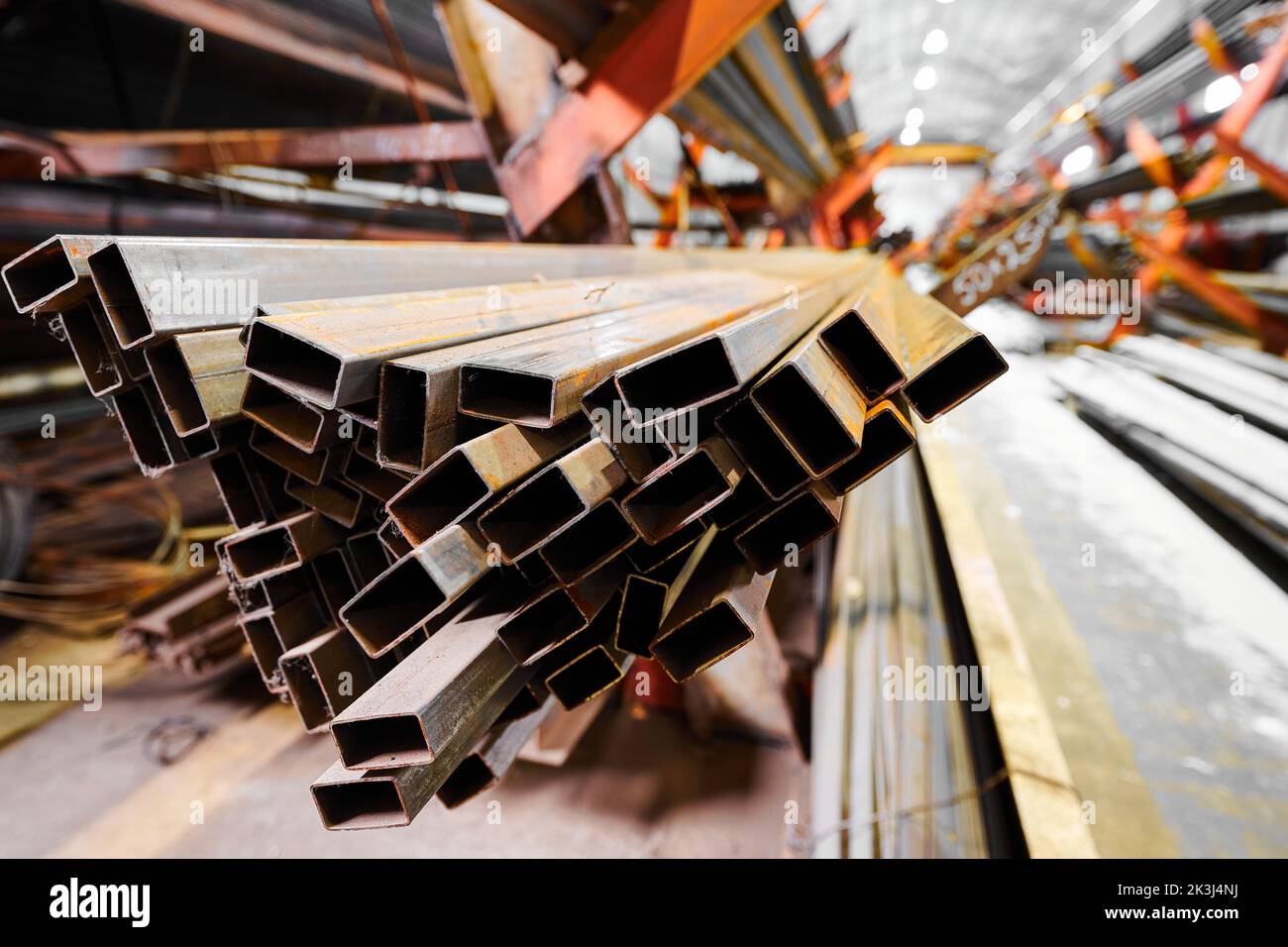 Rectangle heat tubing on rack in cold factory warehouse Stock Photo - Alamy