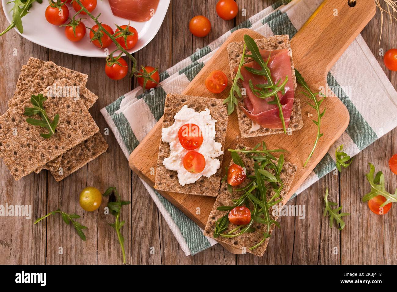 Crispy rye bread with sesame seeds, ham and cottage cheese Stock Photo ...