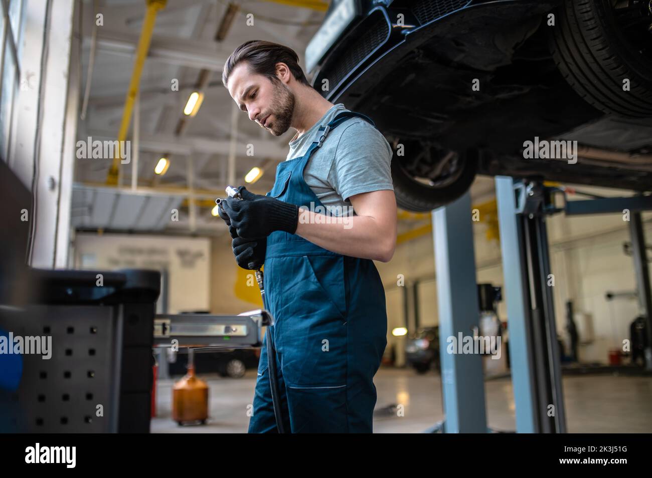 Inspecting hands hi-res stock photography and images - Alamy