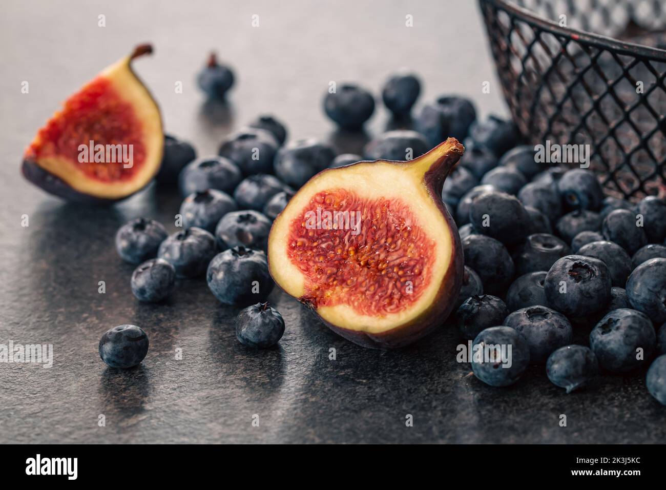 Close-up, figs in the cut among the berries Stock Photo - Alamy