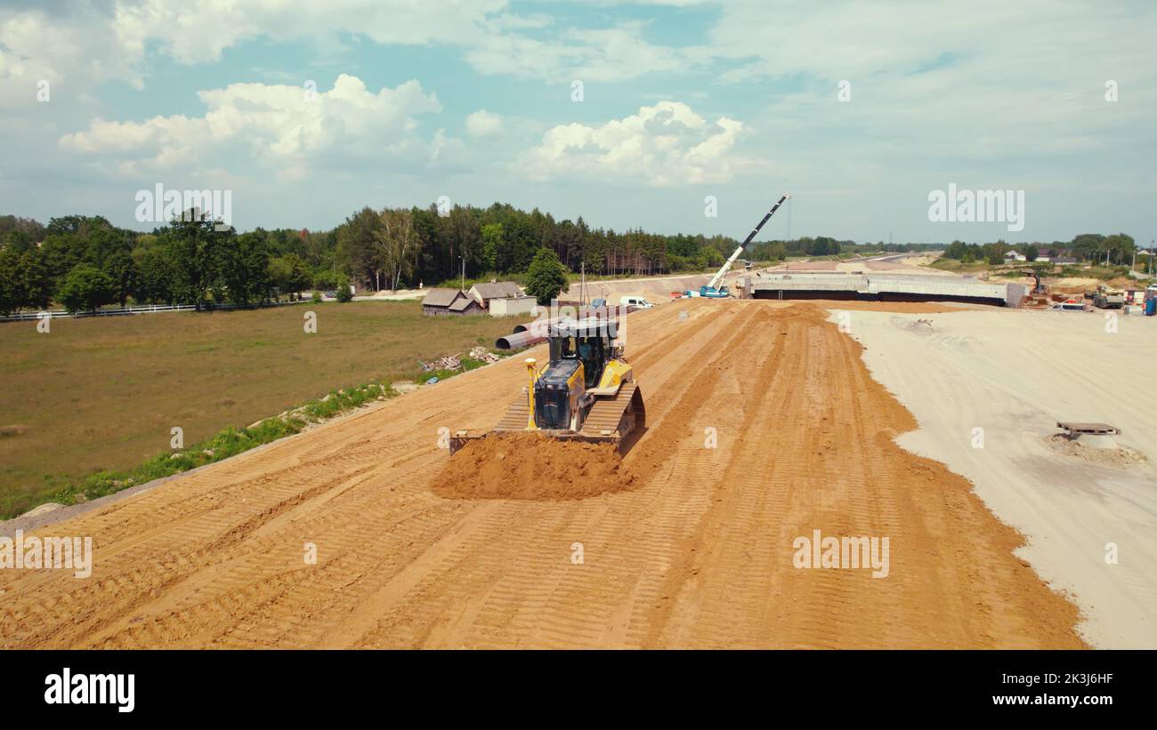 Spreading sand paving hi-res stock photography and images - Alamy