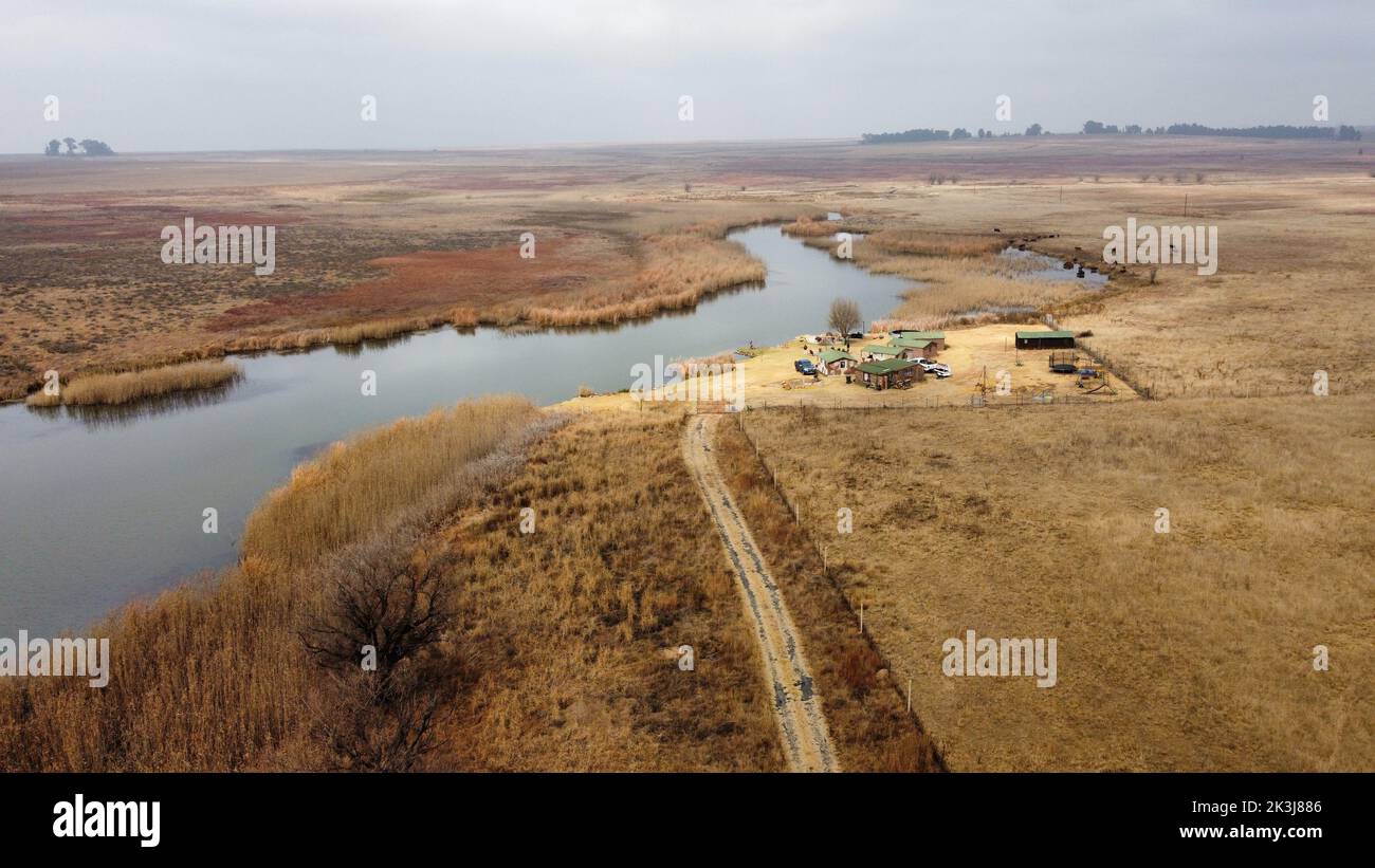 An aerial view of a camp on a river shore Stock Photo - Alamy