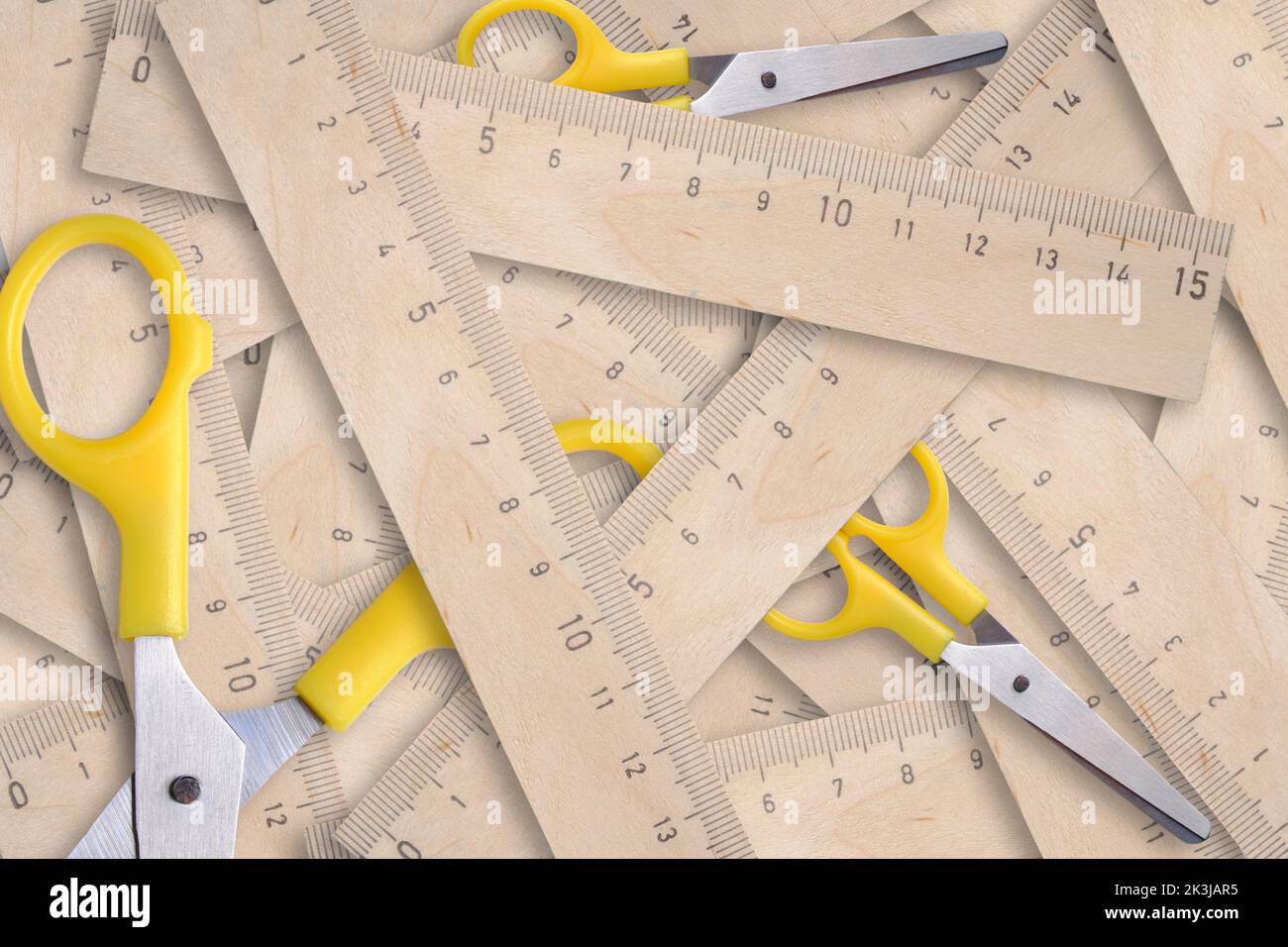 Abstract background lots wooden school rulers and scissors Stock Photo ...