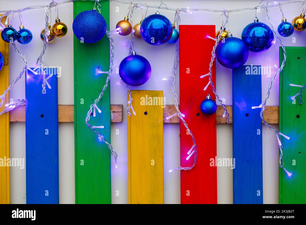Colorful close up details of christmas fair market. Balls decorations ...