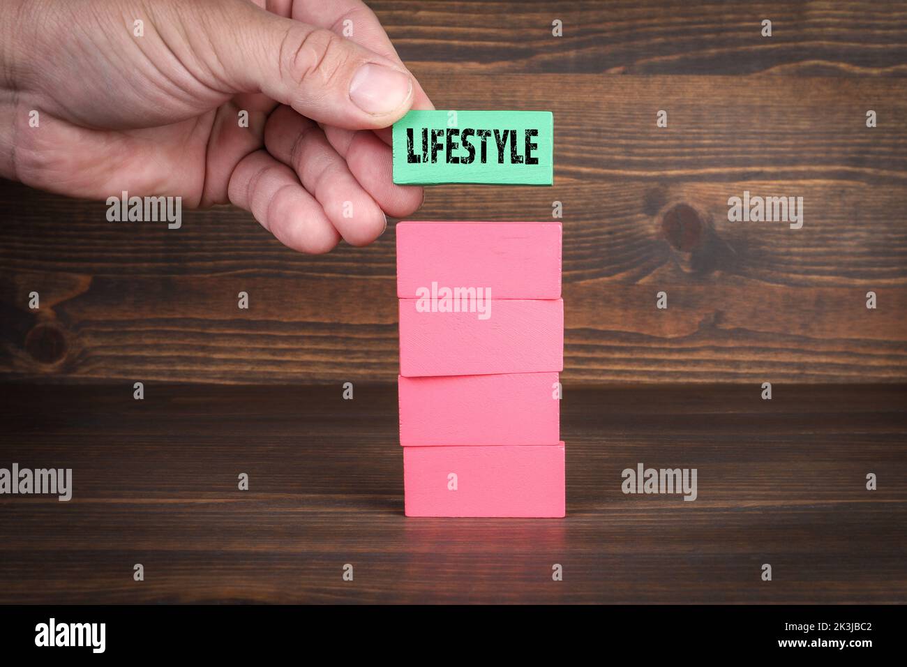 Lifestyle concept. Colorful wooden blocks in a pile Stock Photo - Alamy