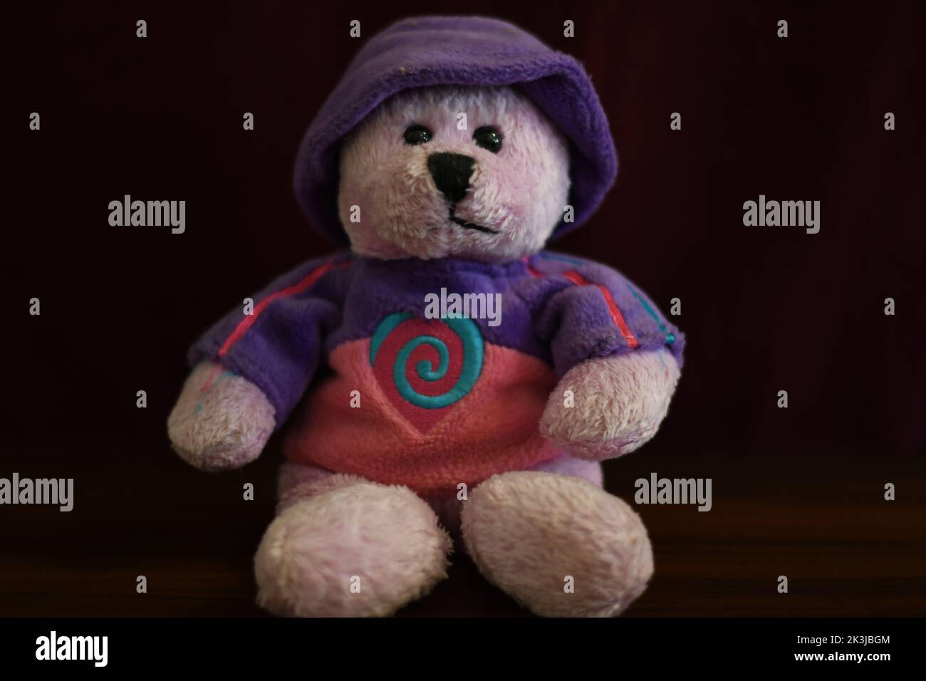a Cute teddy bear in modern clothes Stock Photo - Alamy