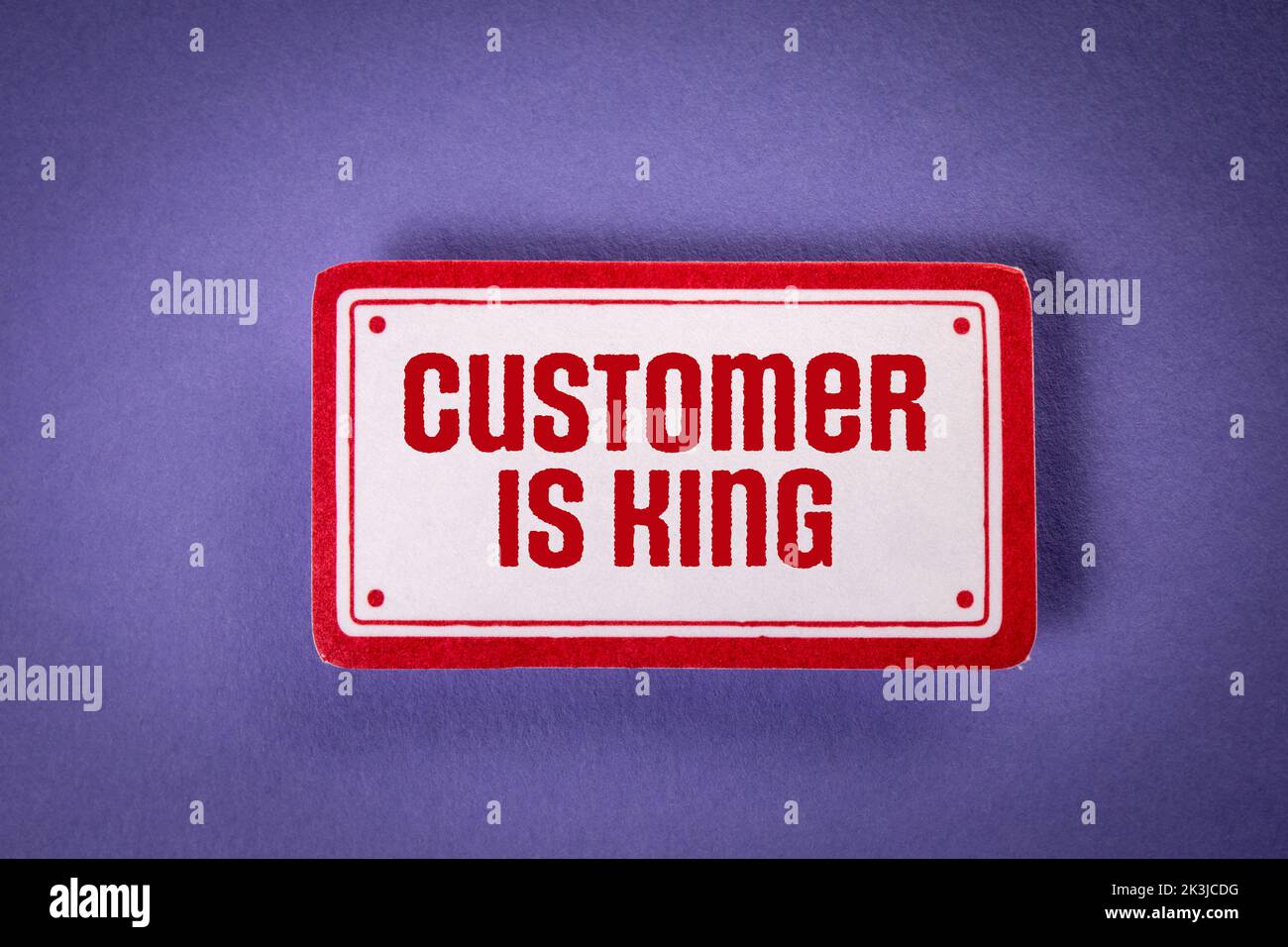 Customer is king. Sticky note with text on purple background Stock ...